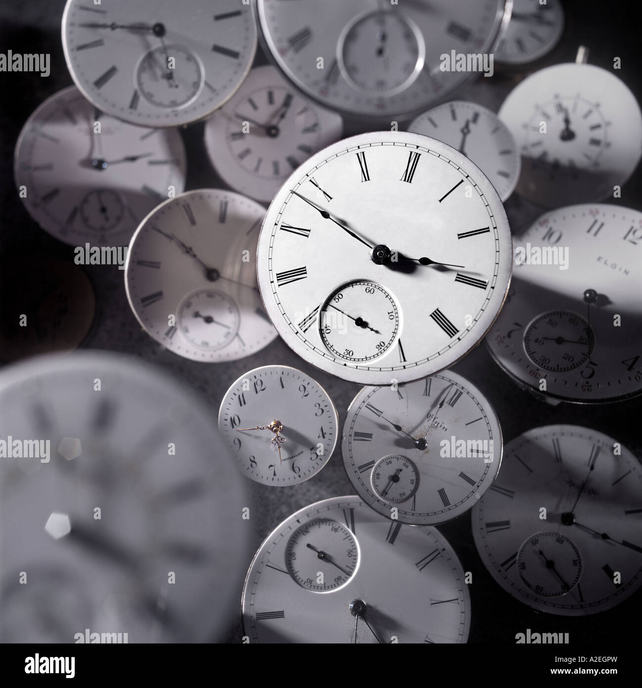 Time - Floating Clocks Watch Faces Showing Various Time Stock Photo - Alamy