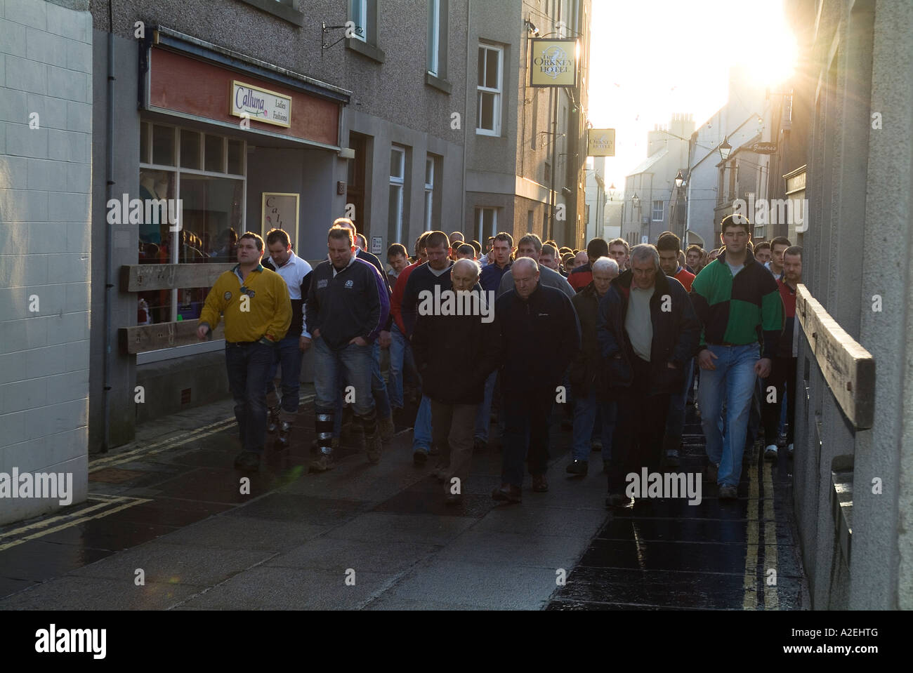 dh The Ba KIRKWALL ORKNEY Doonies Ba team walking up Victoria street to ...