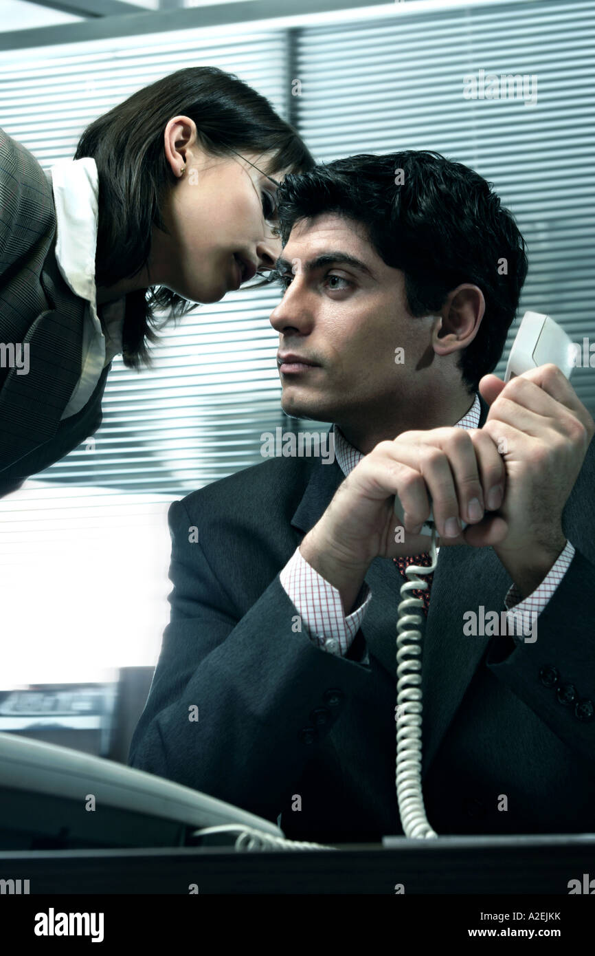 1220023 Indoor Office Work Couple Young Woman Man 25 30 Suit Brunette