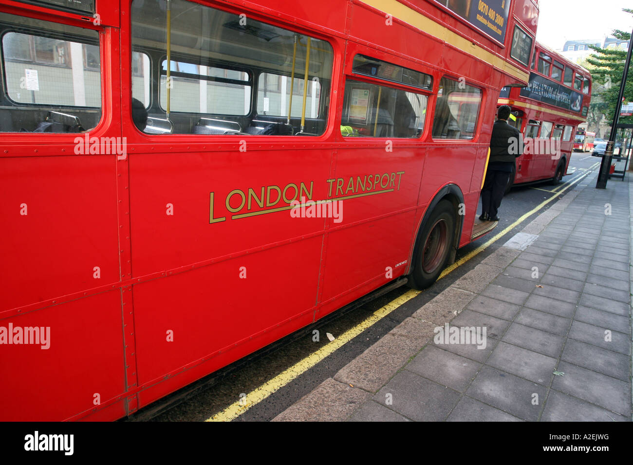 Bus conductor on routemaster hi-res stock photography and images - Alamy
