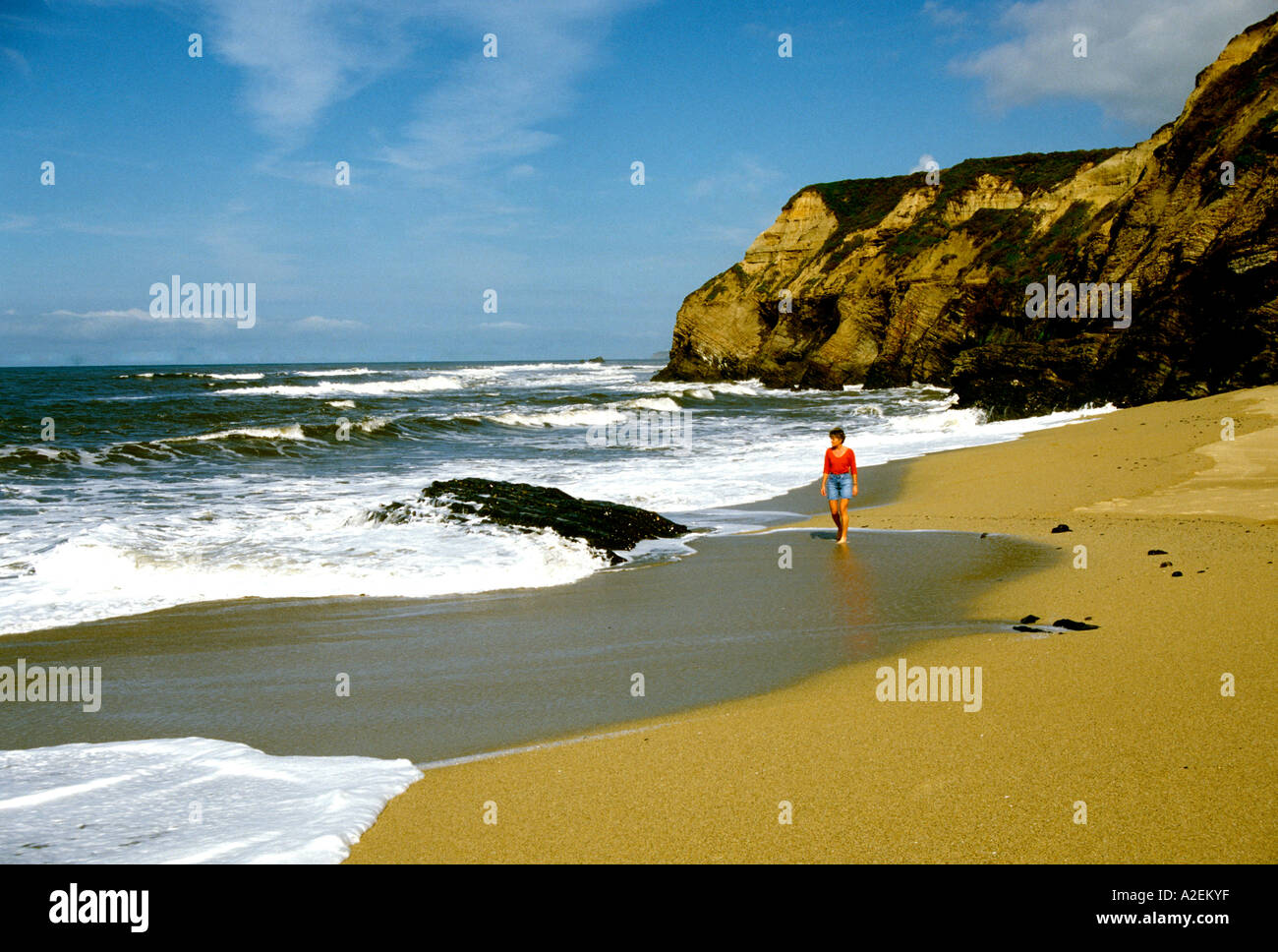 California San Mateo Coast Woman walking on Cowell Ranch State Beach ...