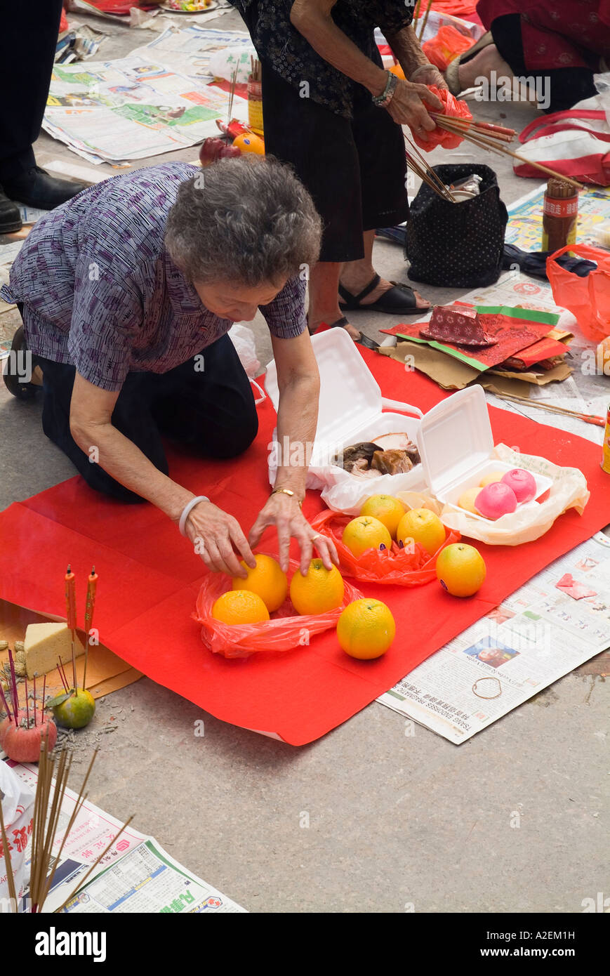 dh Temple WONG TAI SIN HONG KONG Elderly worshipper food offerings ...
