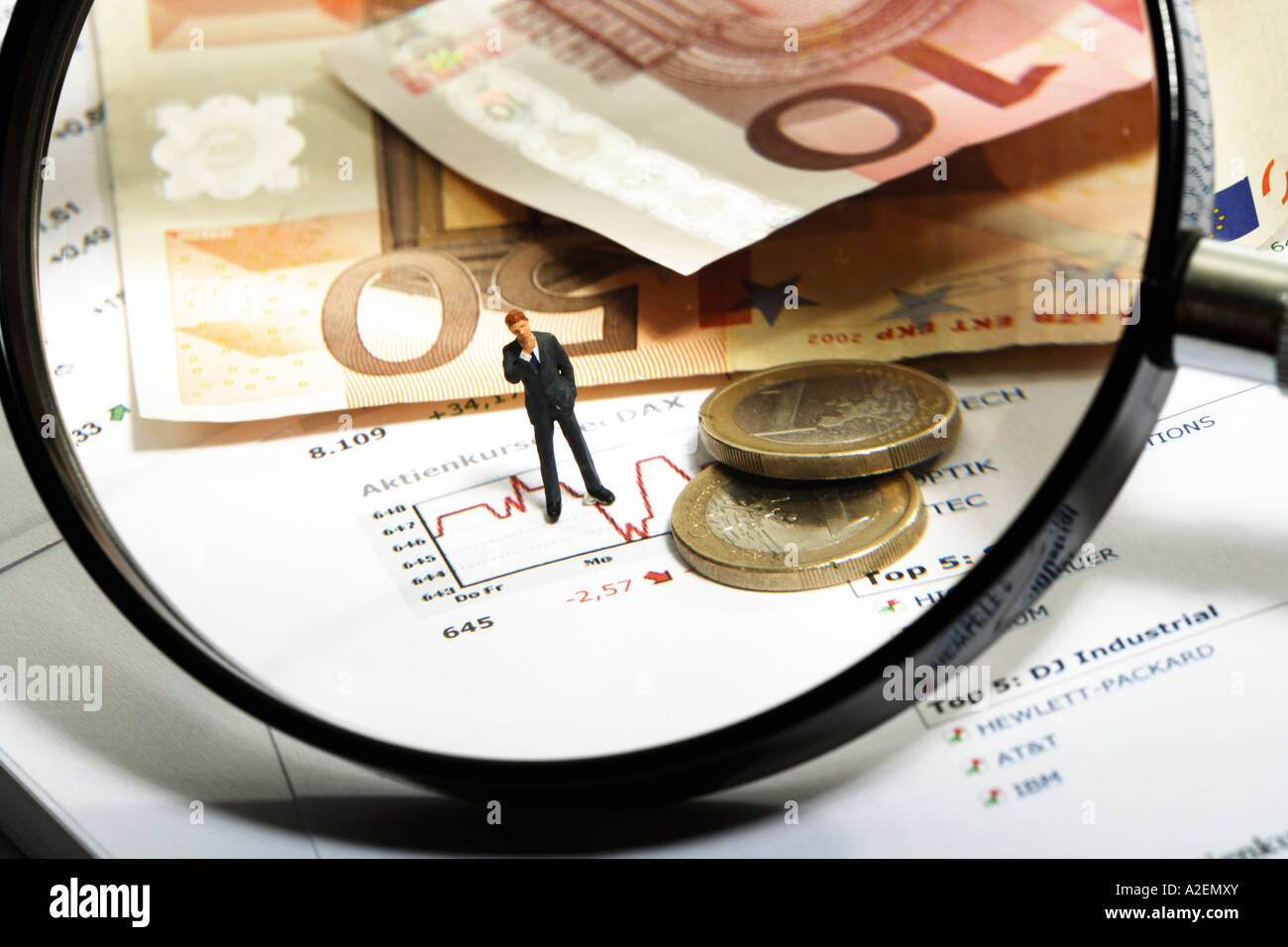 Financial charts magnifying glass hi-res stock photography and images ...