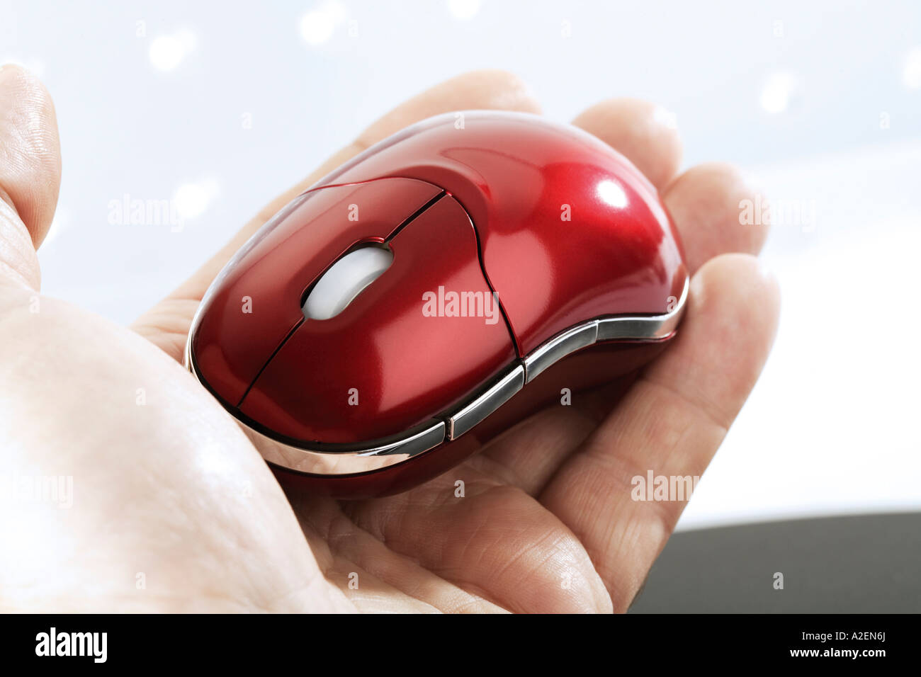 Man holding PC mouse Stock Photo - Alamy