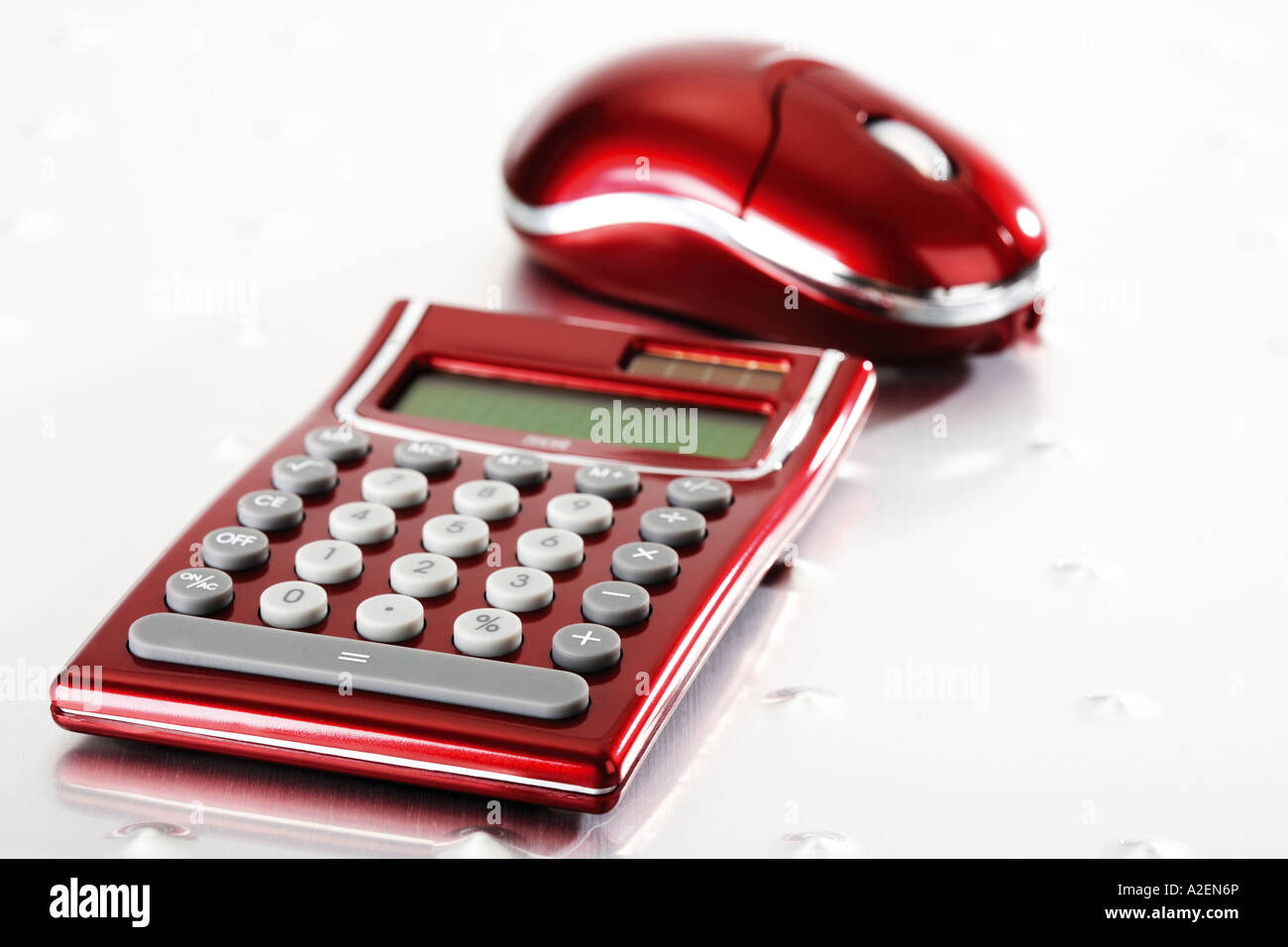 Calculator and mouse Stock Photo - Alamy