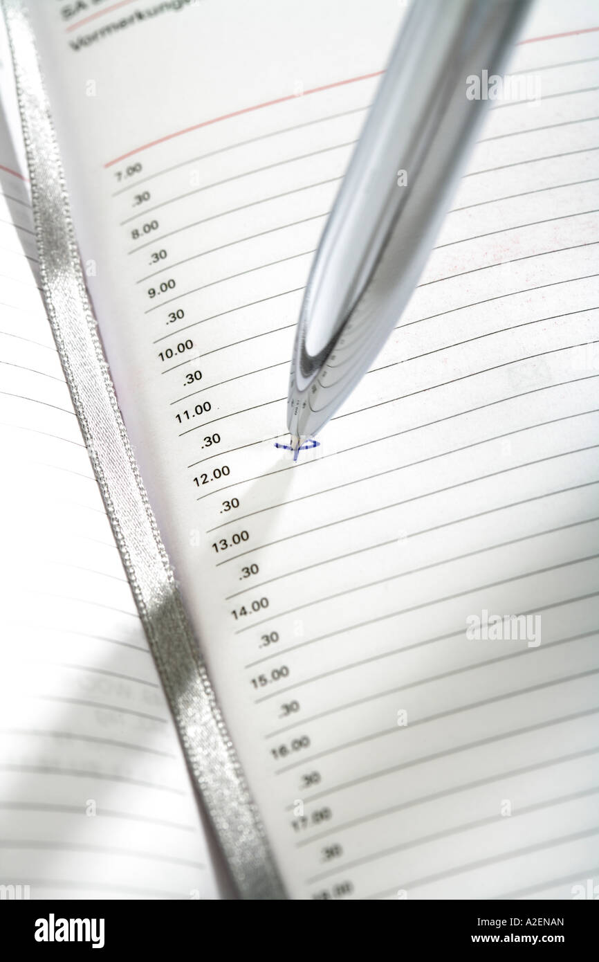 Diary and ball-point, close-up Stock Photo - Alamy