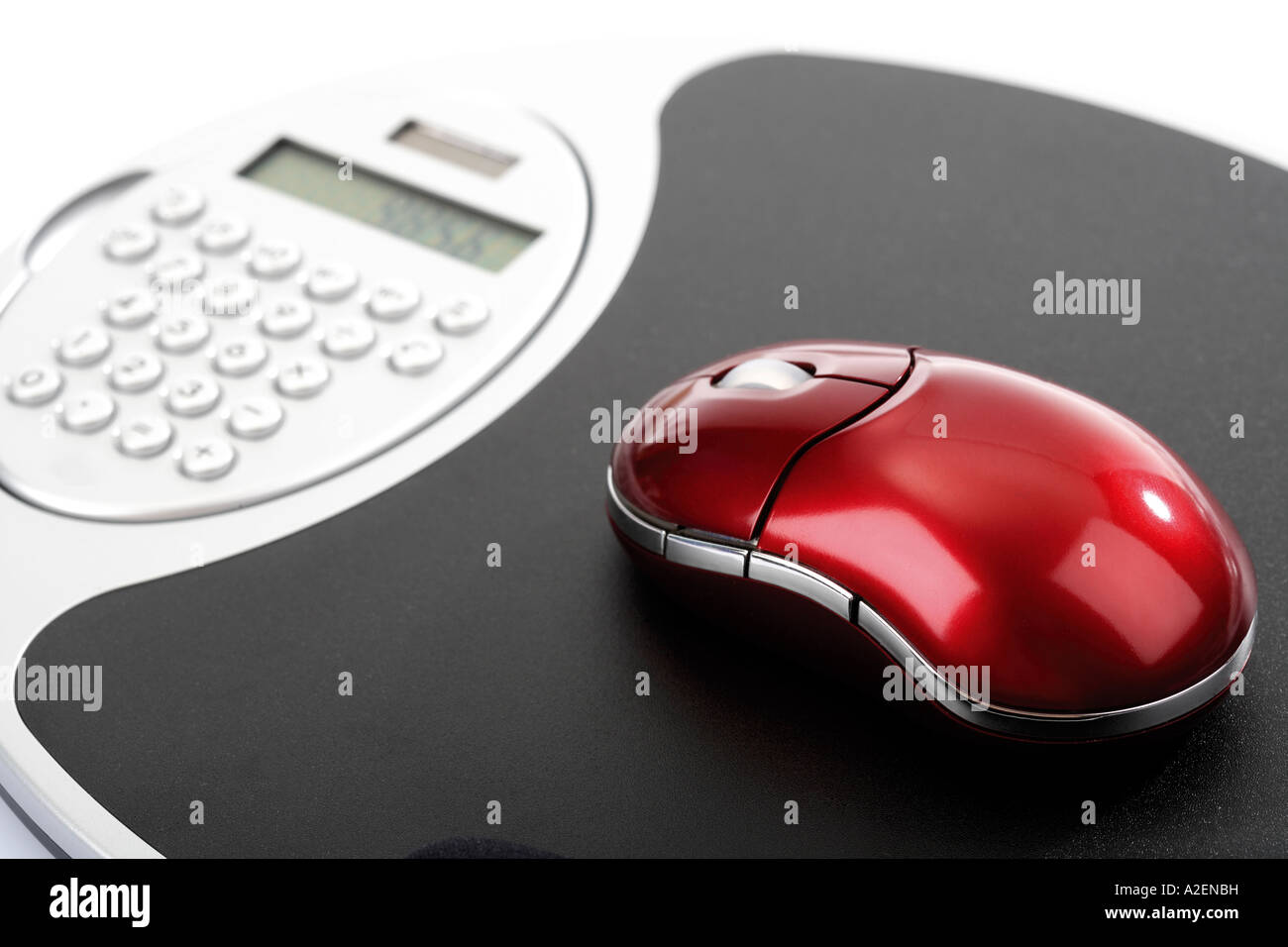 Mouse on a mousepad with integrated calculator Stock Photo - Alamy