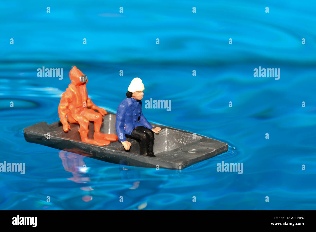 Two figurines in boat, close-up Stock Photo - Alamy