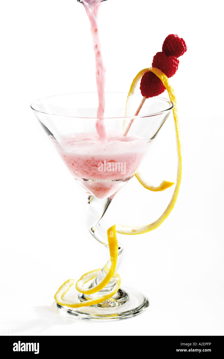 Pouring cocktail into glass Stock Photo - Alamy