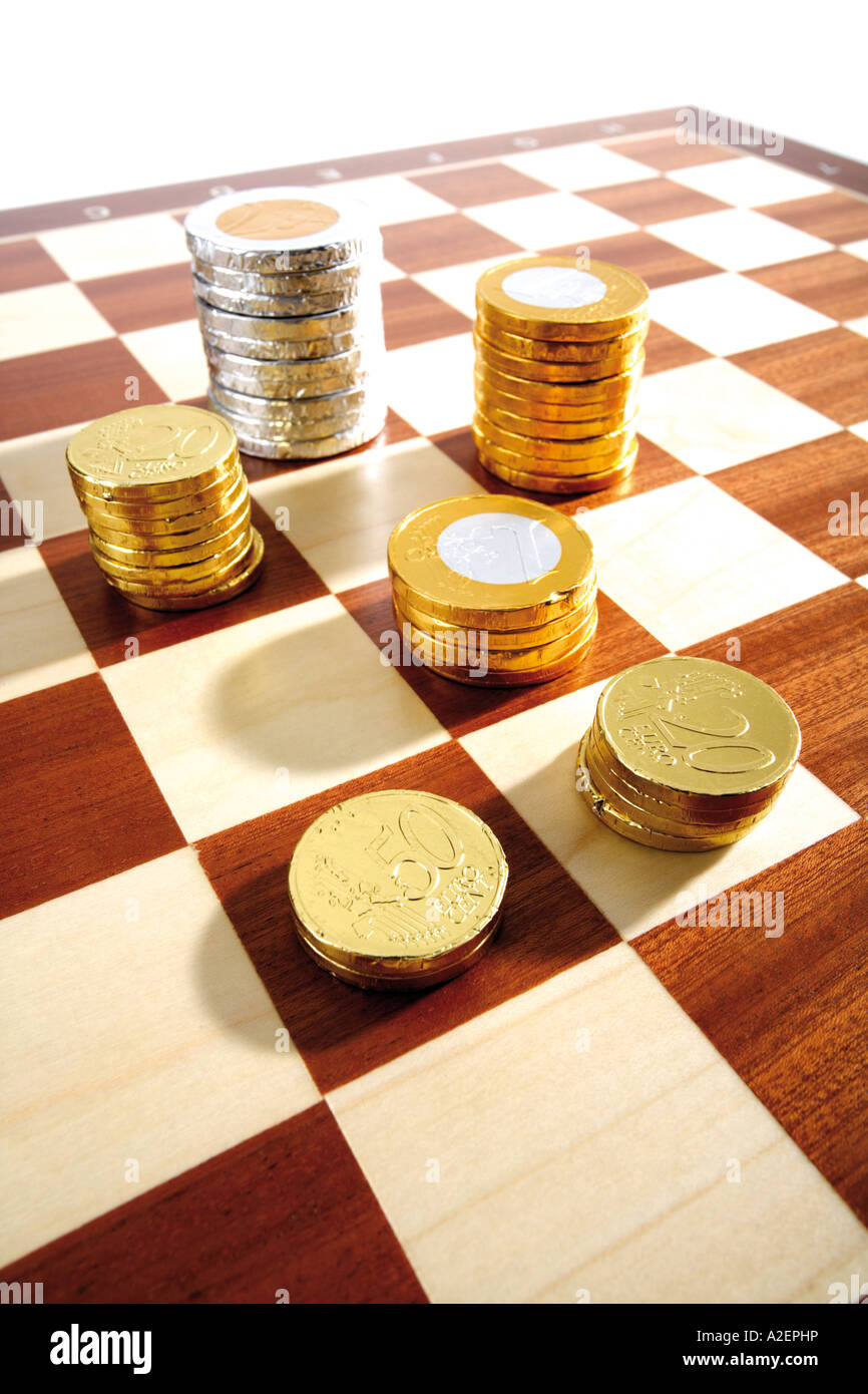 Chess boards money strategy hi-res stock photography and images - Alamy