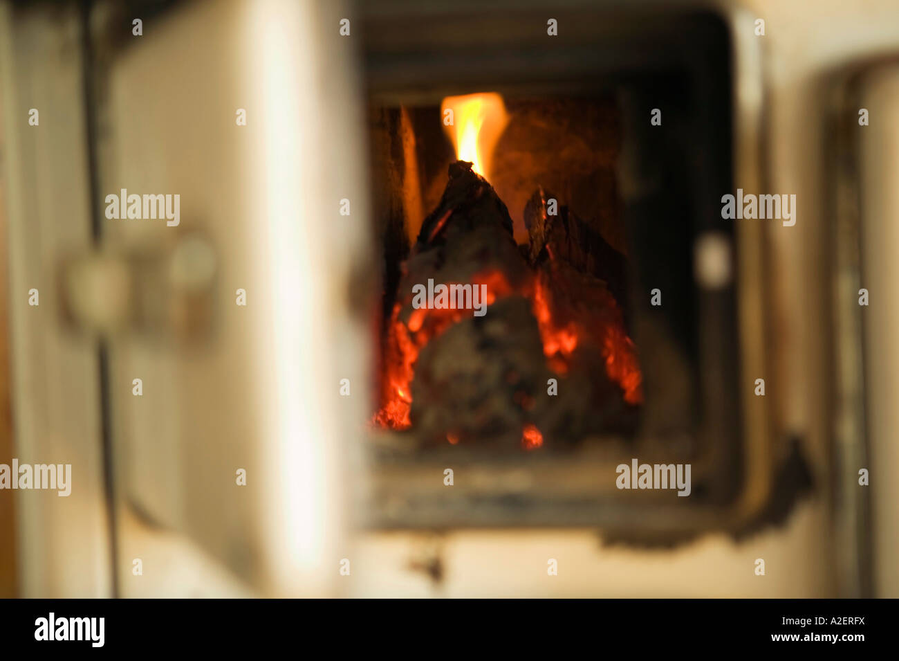Opened wood stove, close-up Stock Photo - Alamy