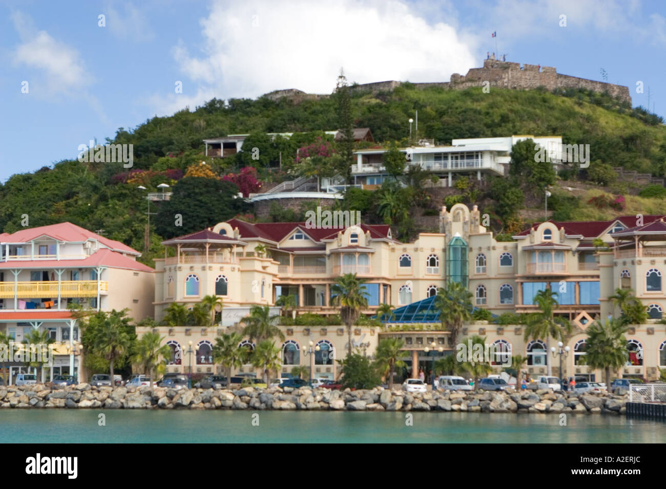 Fort St. Louis sits atop a hill above a modern day luxury shopping mall ...
