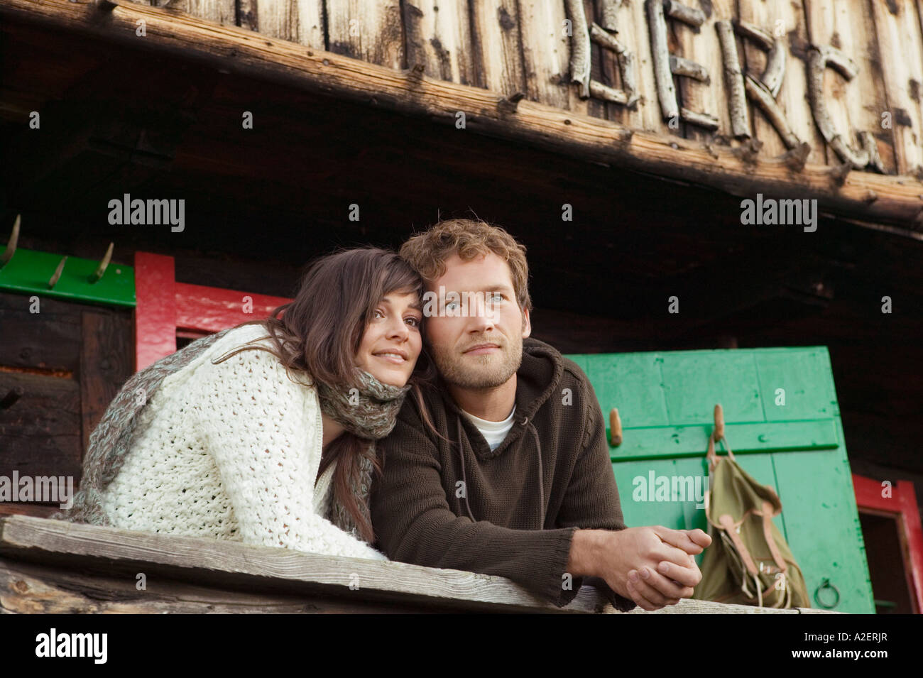 Man and woman leaning on rail hi-res stock photography and images - Alamy