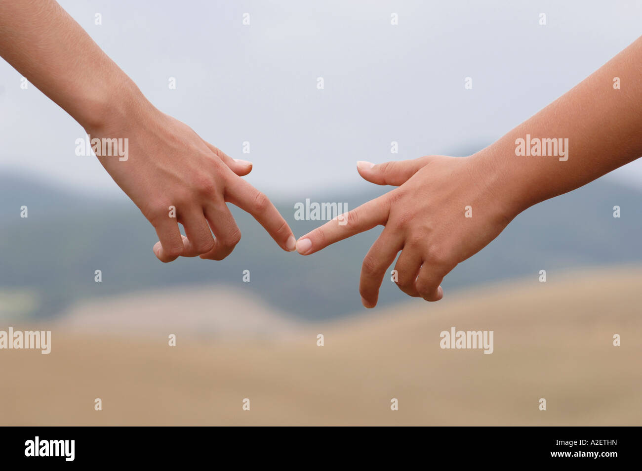 Forefinger touching, close-up Stock Photo - Alamy