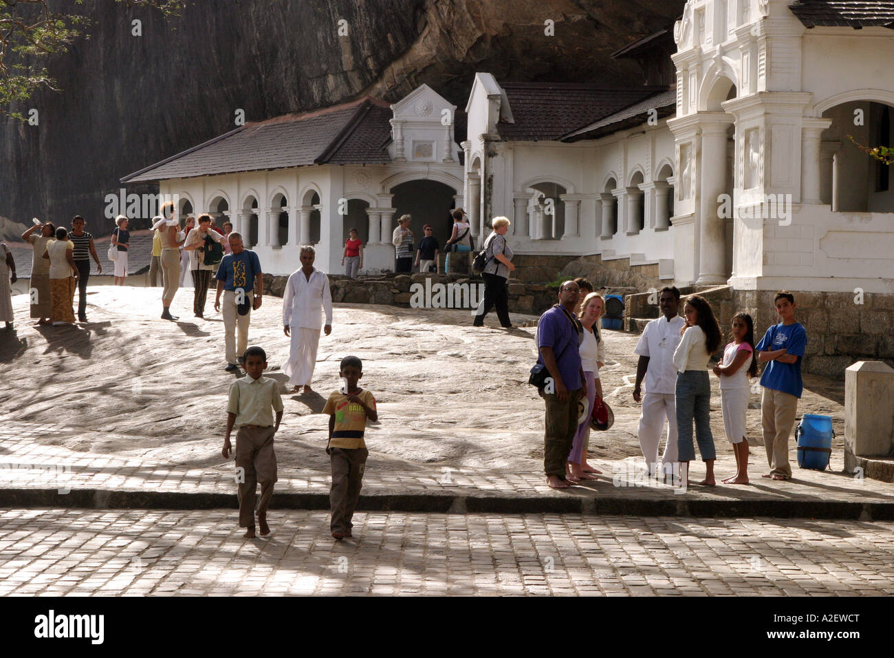 Dambulla Sri Lanka: Tourists and local people, Dambulla cave temple ...