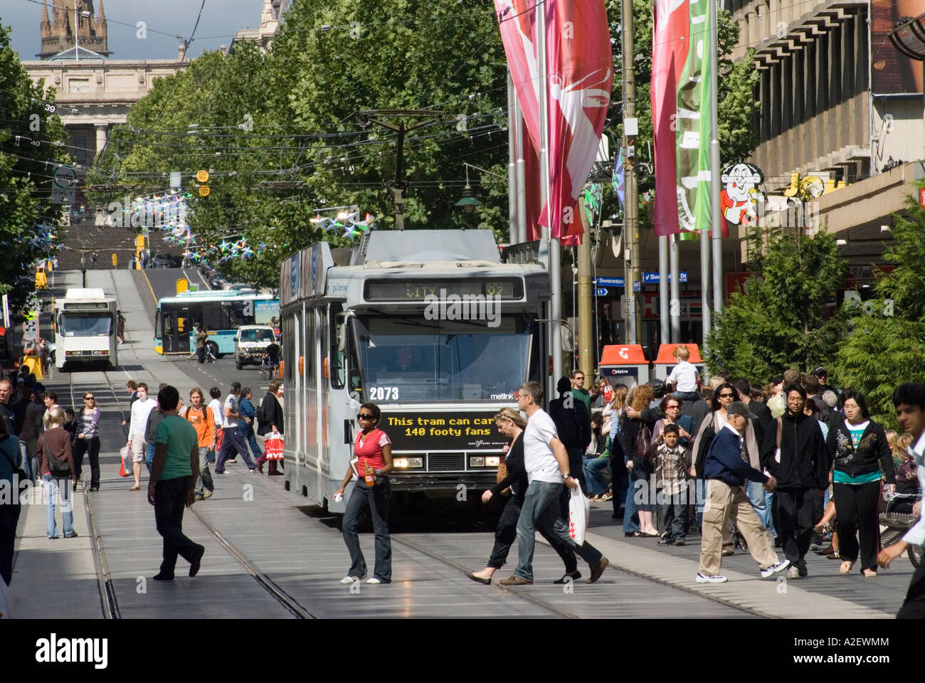 Trams and people in Bourke Street Mall downtown Melbourne Victoria ...