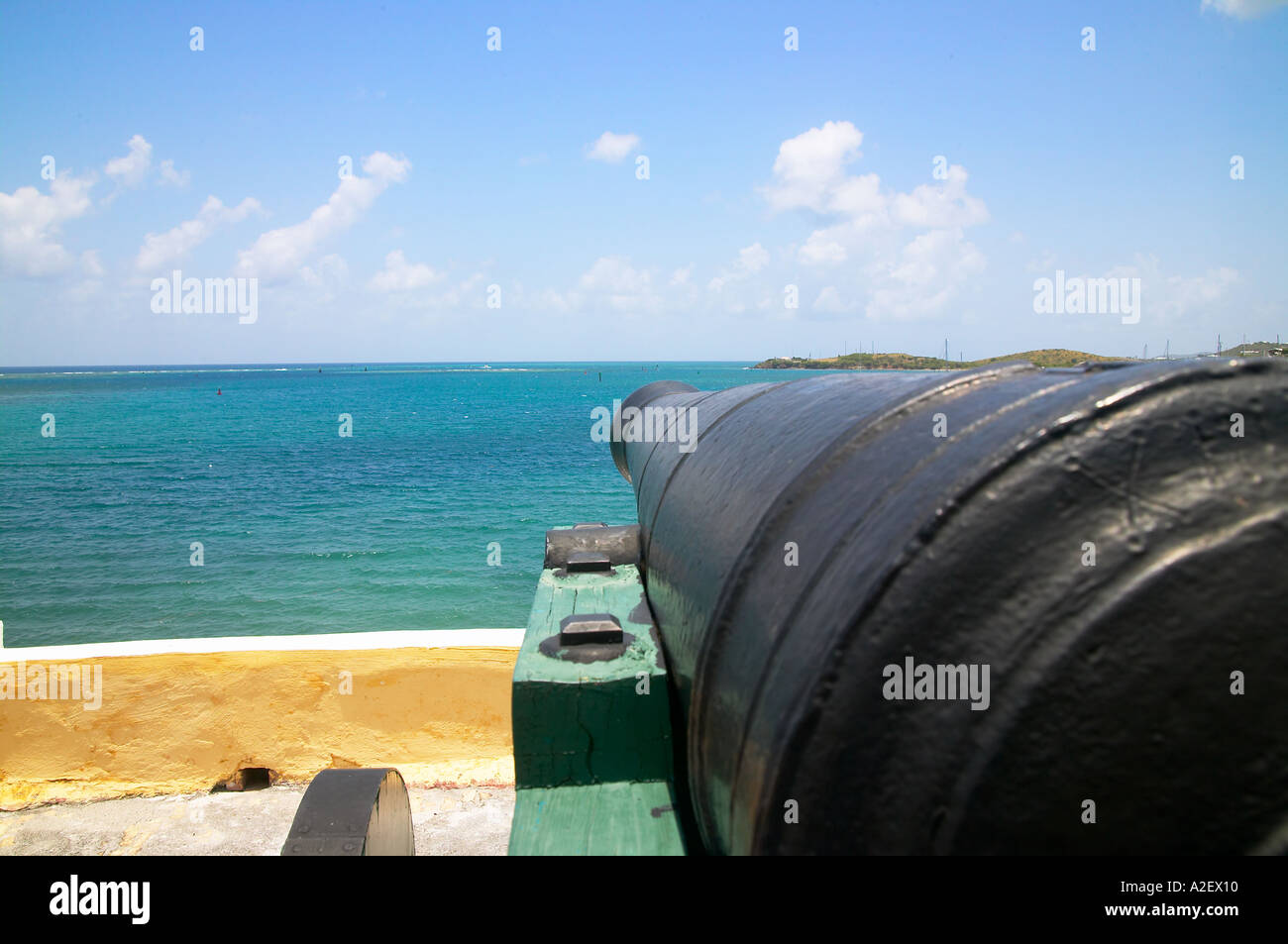 Canon poised over Caribbean bay at Fort Christiansted St Croix Stock ...