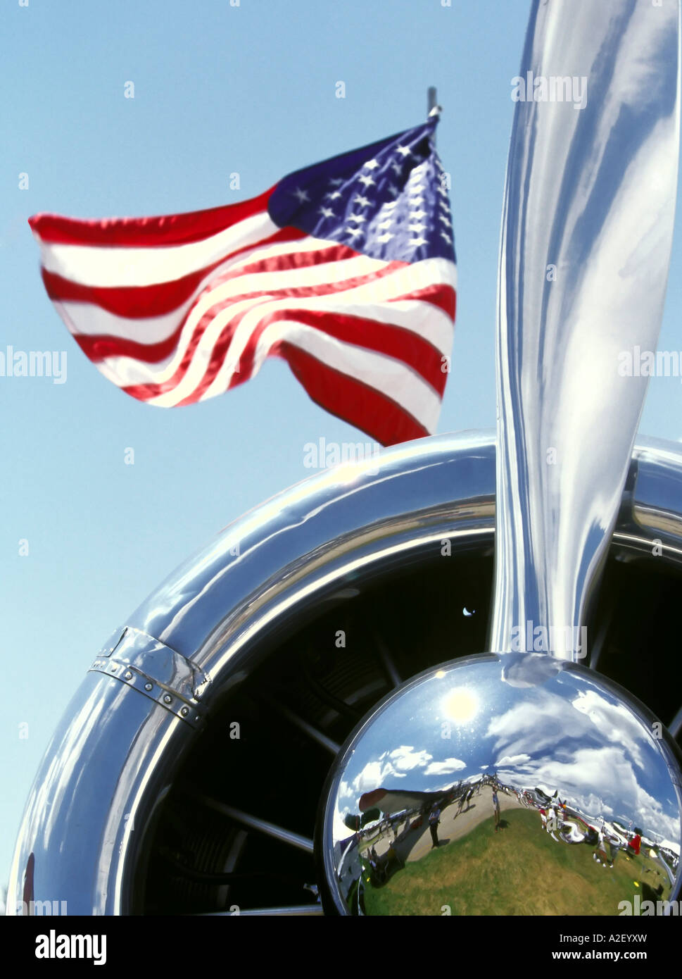 Plane propeller and American flag at EAA Fly In Oshkosh Wisconsin USA ...