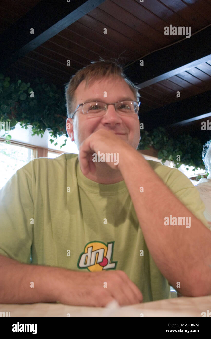 Thoughtful man age 39 at family reunion. Spring Green Wisconsin USA ...