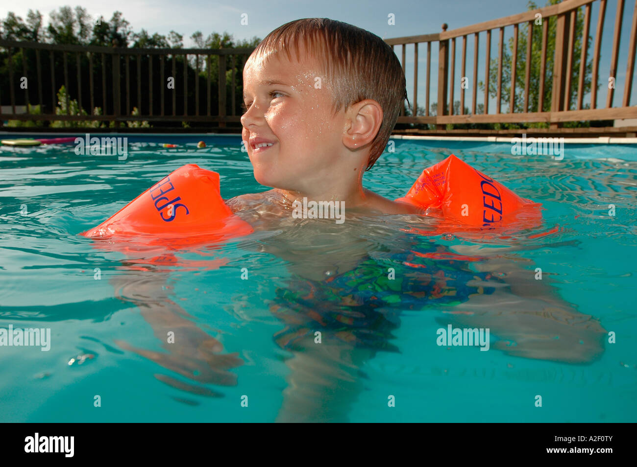5 year old swimming in pool hi-res stock photography and images - Alamy