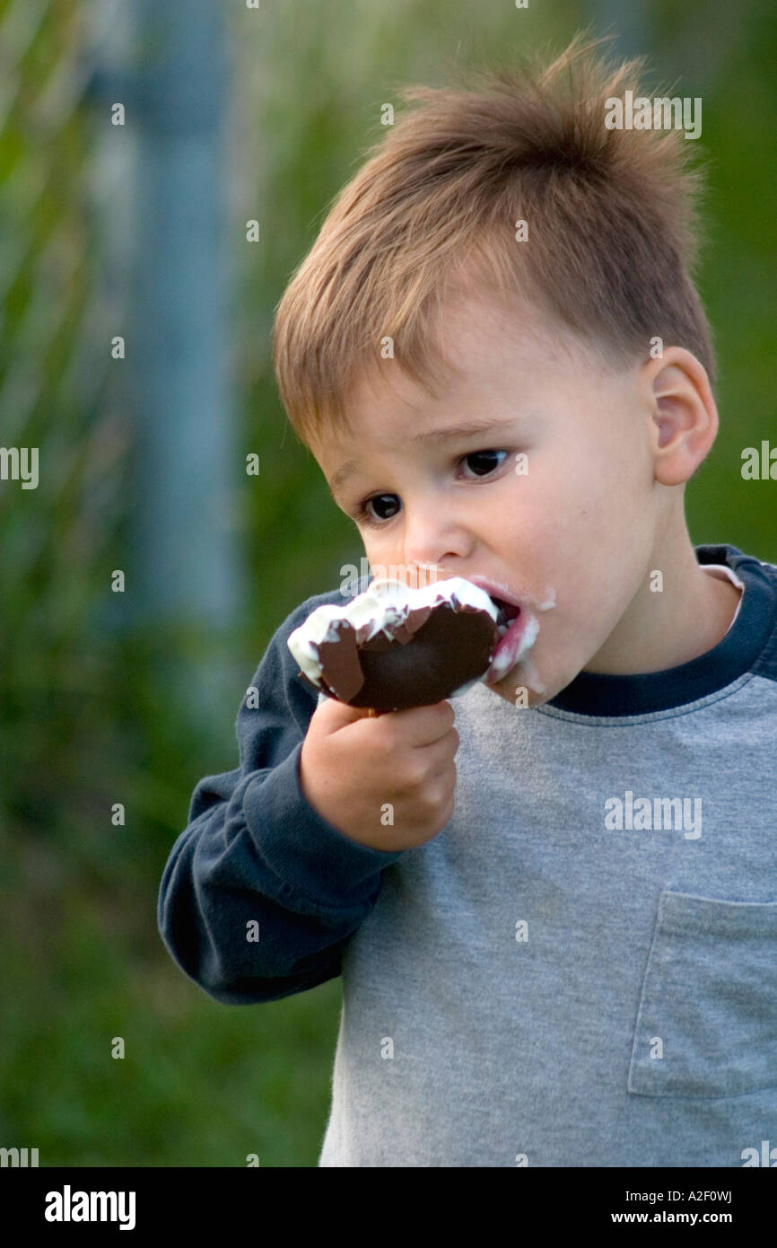 3 Year Old Eating An Ice Cream Bar St Paul Minnesota USA Stock Photo 
