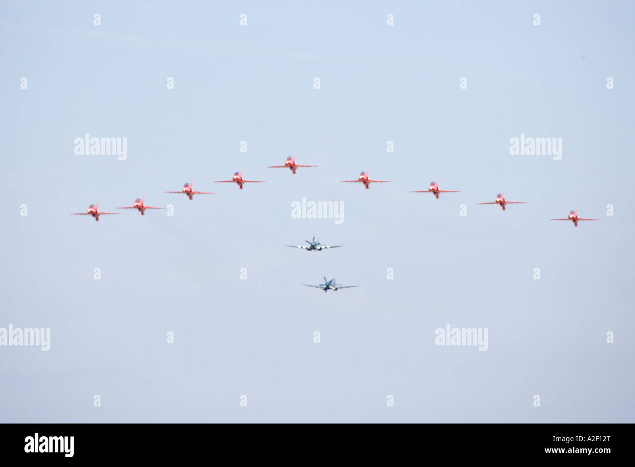 RAF Red Arrows flying in formation with Spitfire and Hurricane from ...