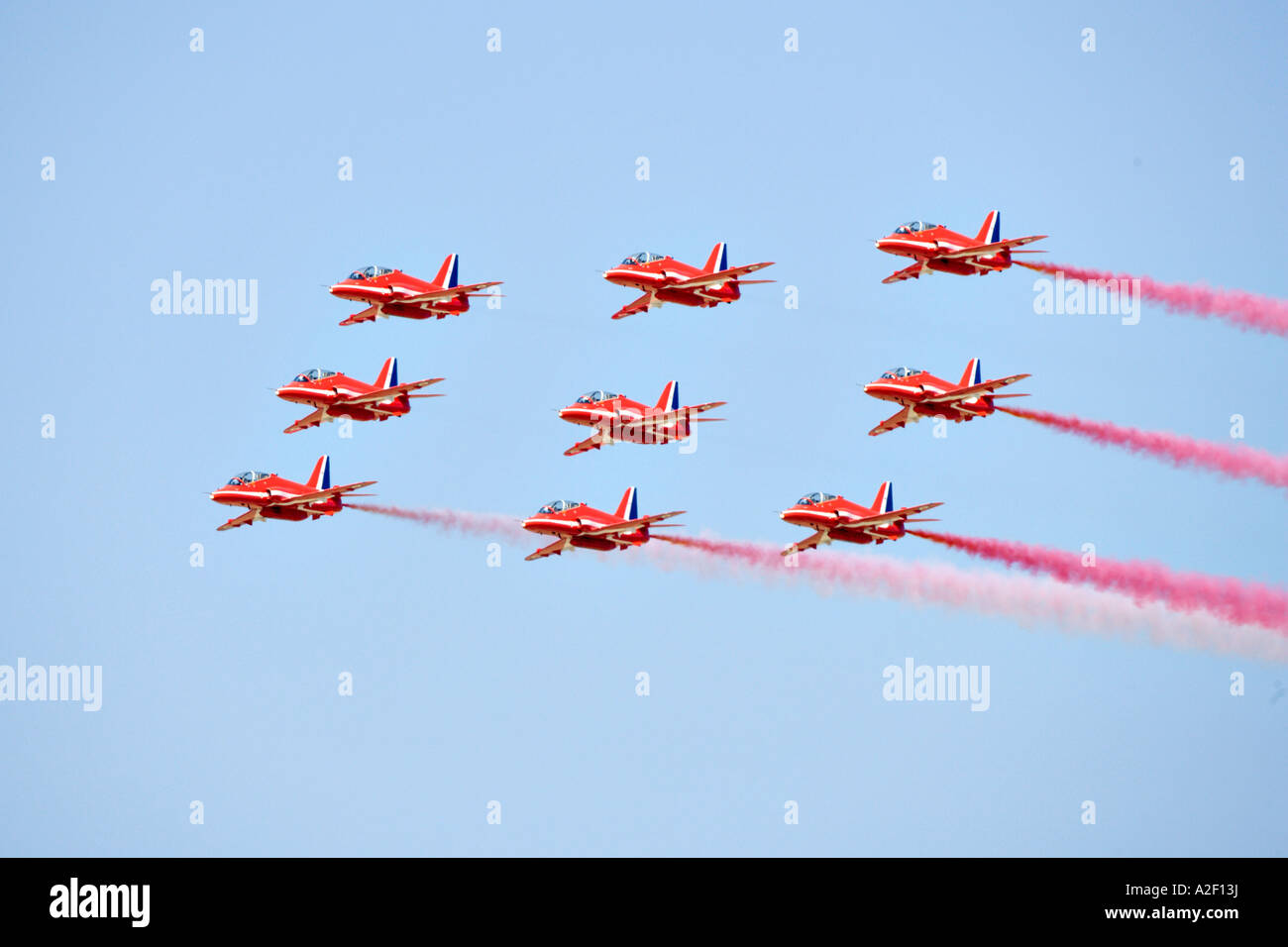 RAF Red Arrows flying in formation Stock Photo - Alamy
