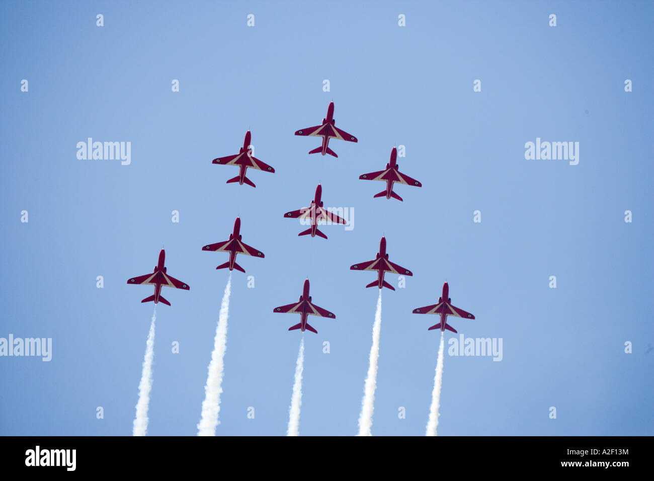 RAF Red Arrows flying in formation Stock Photo - Alamy