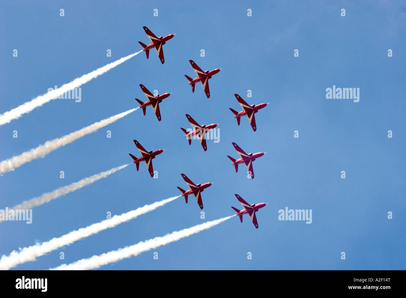 RAF Red Arrows flying in formation Stock Photo - Alamy