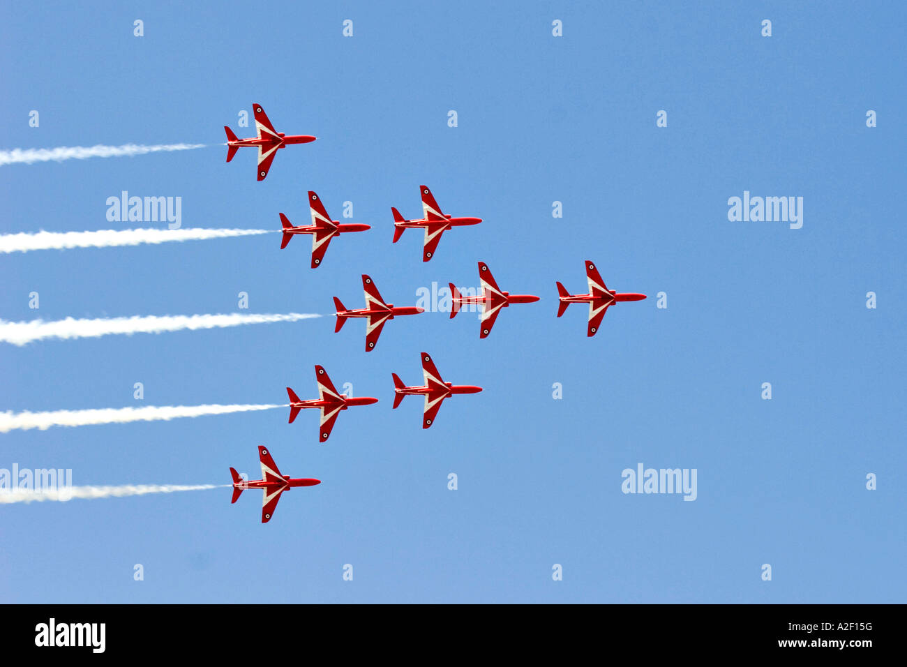 RAF Red Arrows flying in formation Stock Photo - Alamy