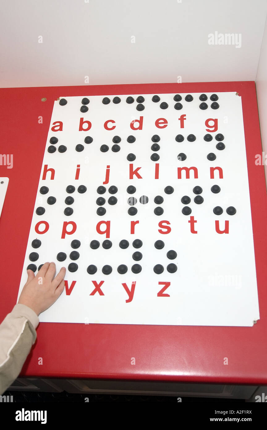 P32 193 6 year-old puts hand on Braille display - London Childrens ...