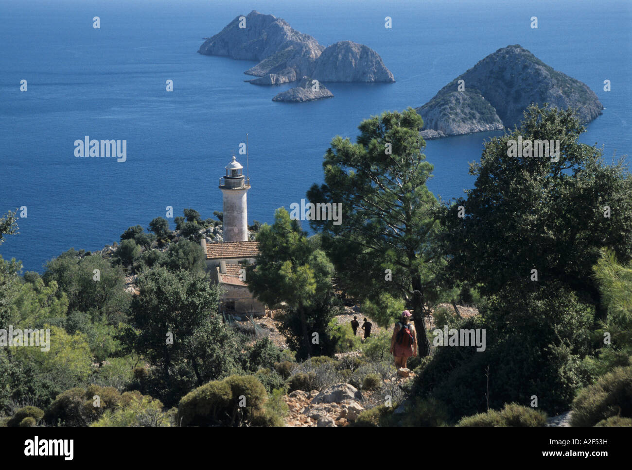 Hikers walking gelidonia lighthouse in hi-res stock photography and ...