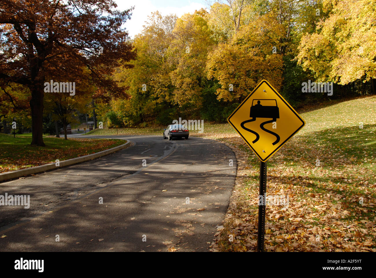 Curvy road sign Stock Photo - Alamy
