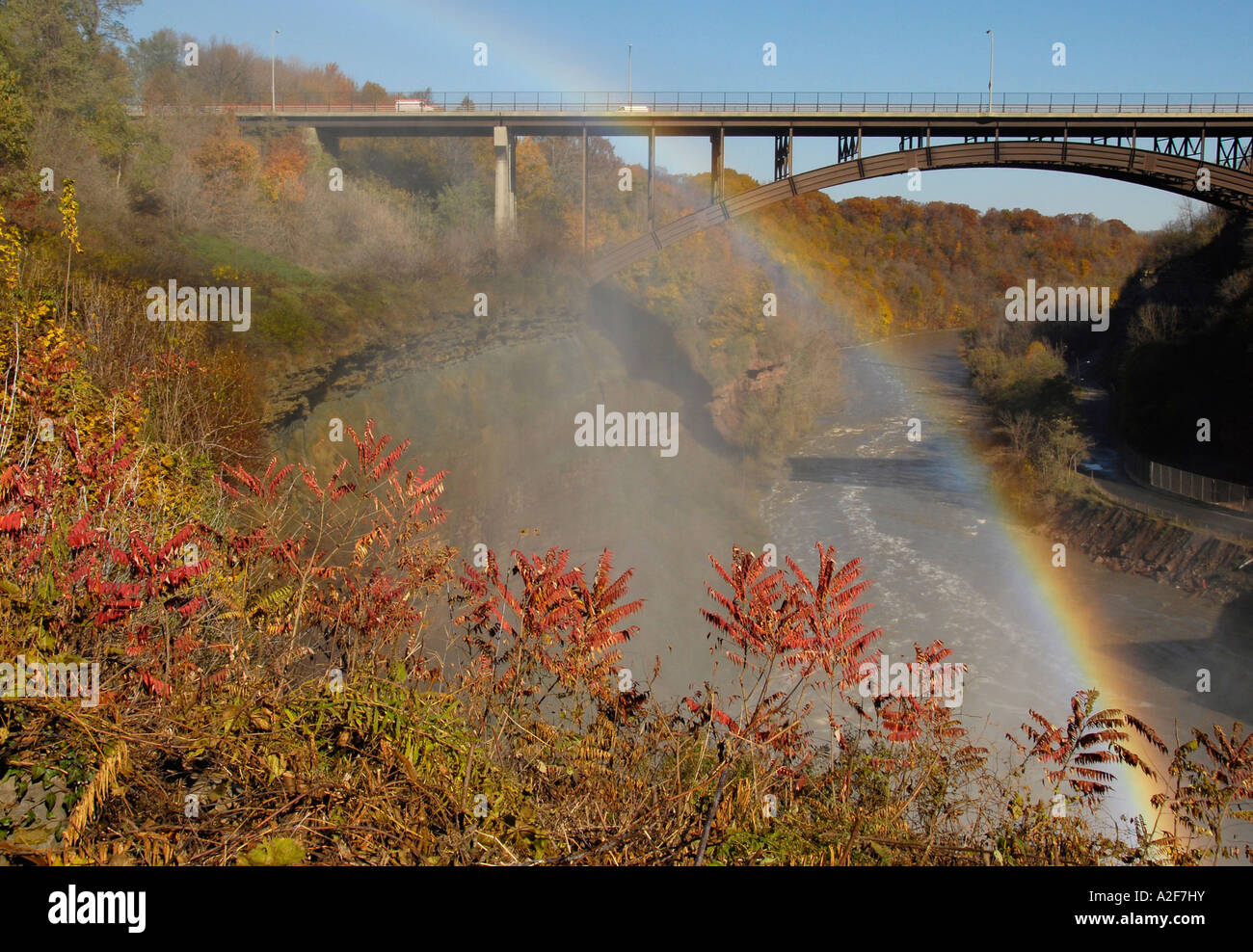 Rainbow and bridge Stock Photo - Alamy