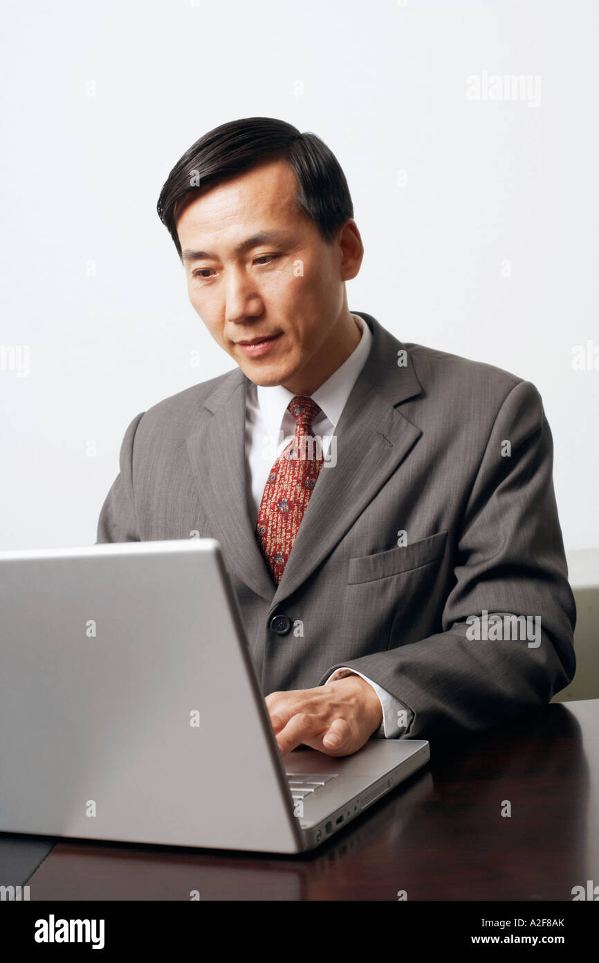 Close-up of a businessman using a laptop Stock Photo - Alamy