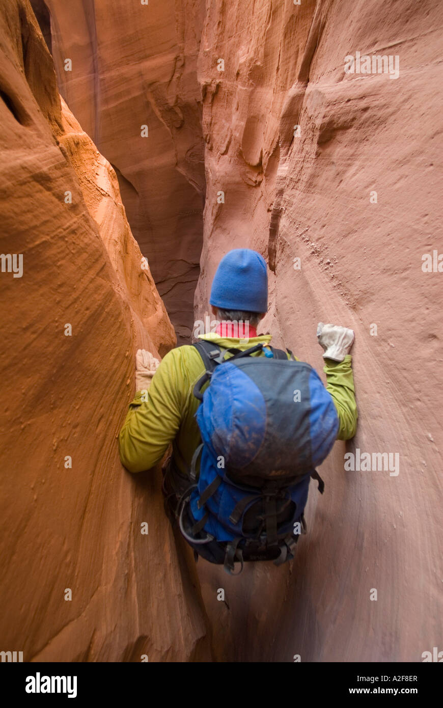 Man with a backpack canyoneering, Canyonlands, Utah Stock Photo - Alamy
