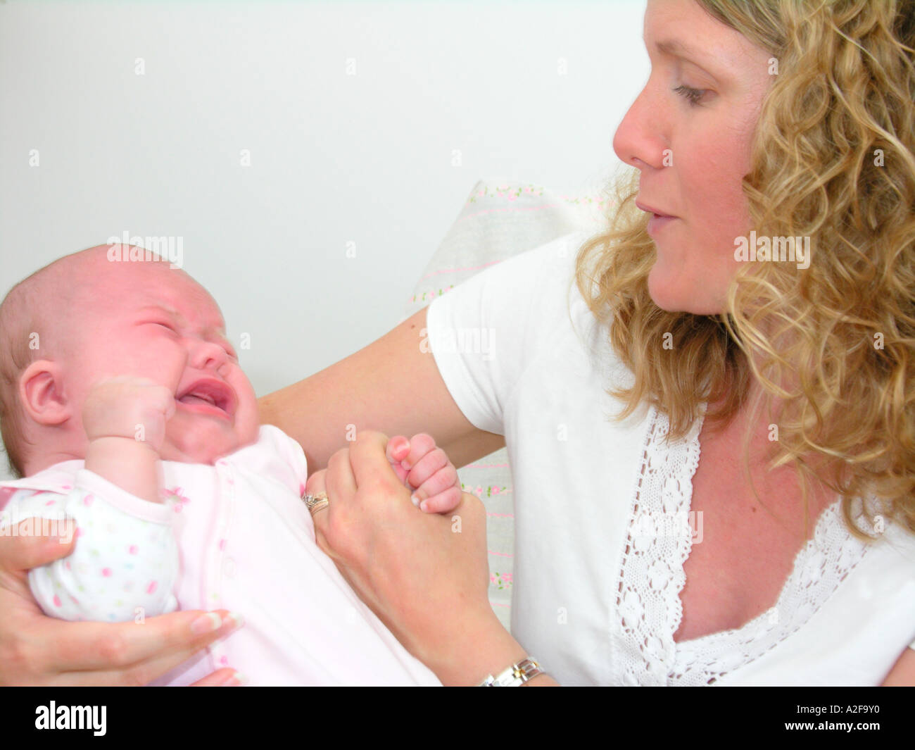 Child trying to cuddle girl hi-res stock photography and images - Alamy