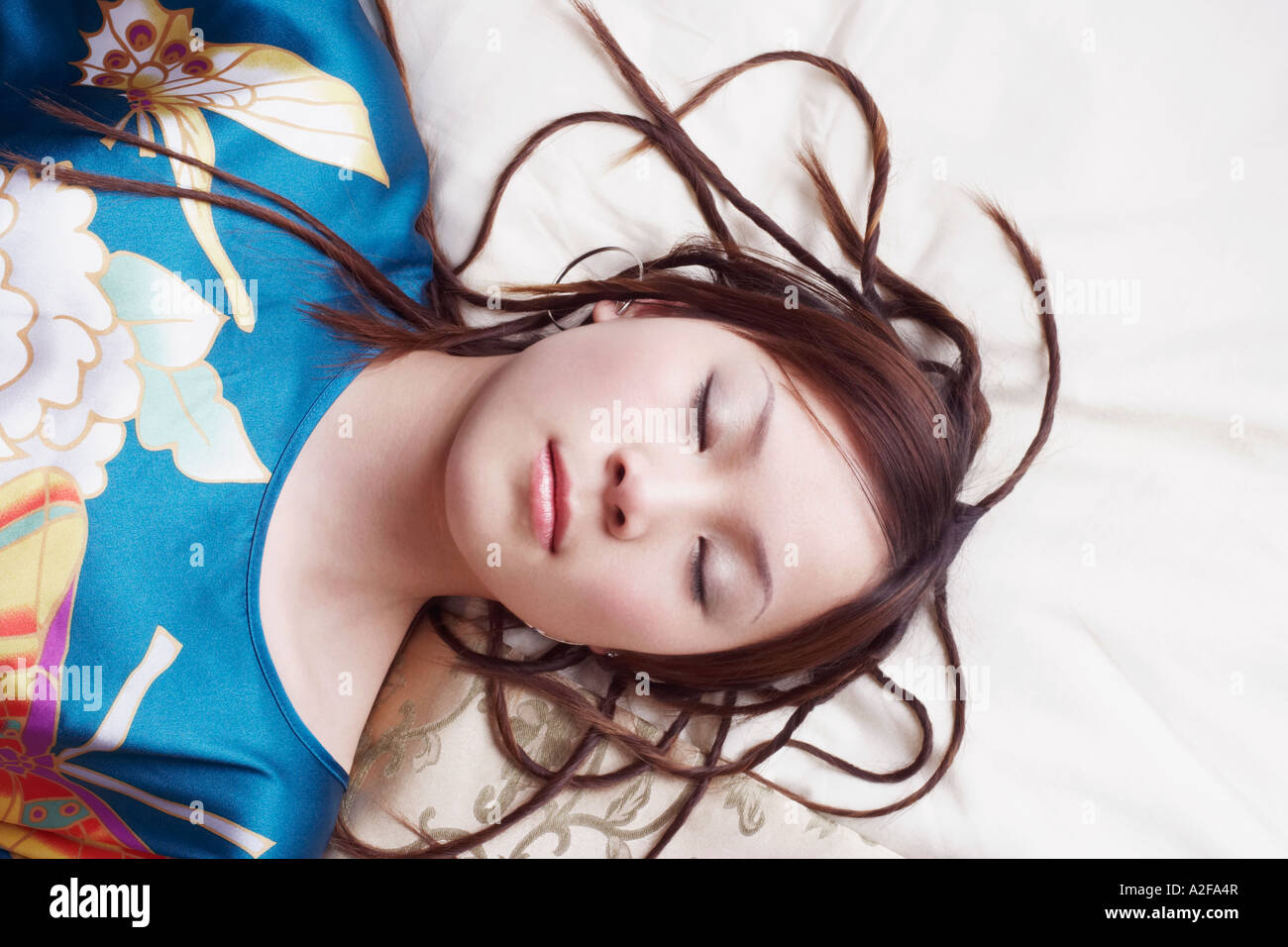 Female eyes above sheet hi-res stock photography and images - Alamy
