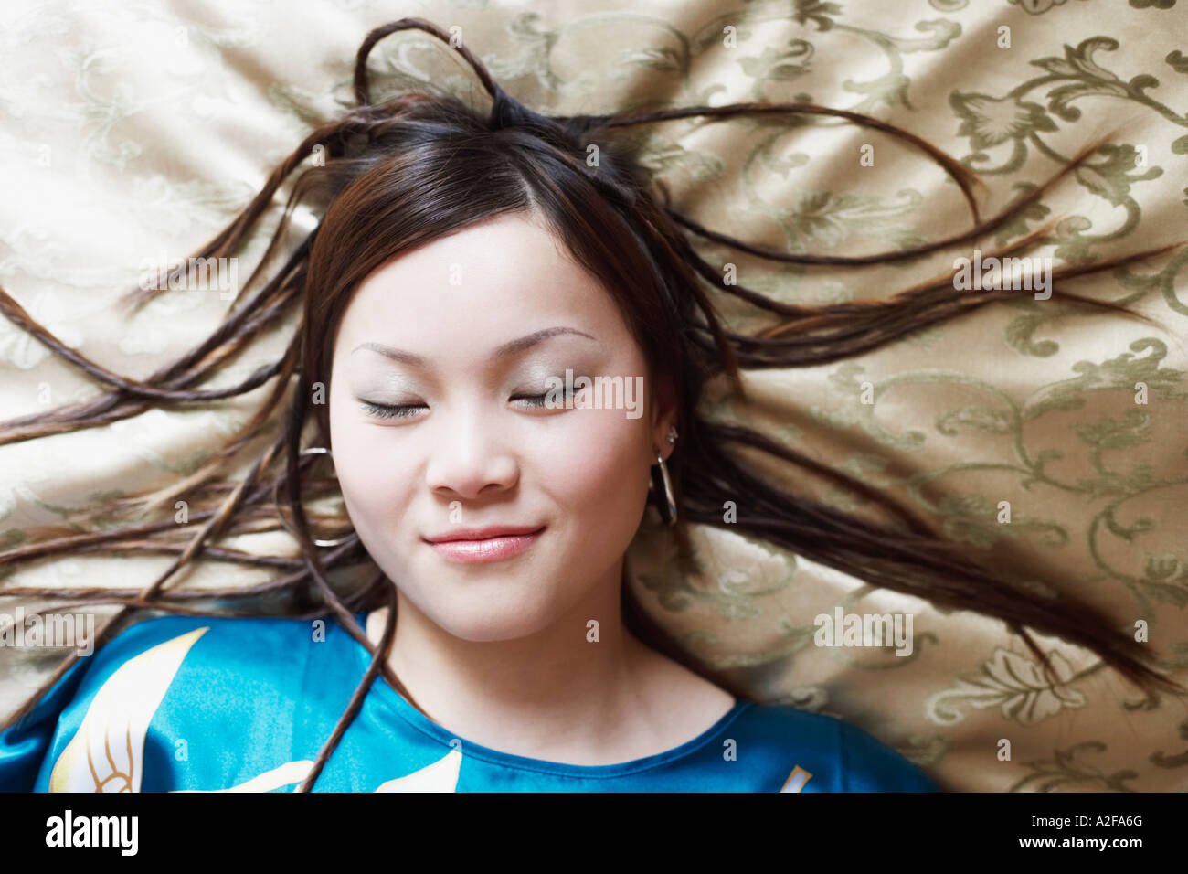 Female eyes above sheet hi-res stock photography and images - Alamy