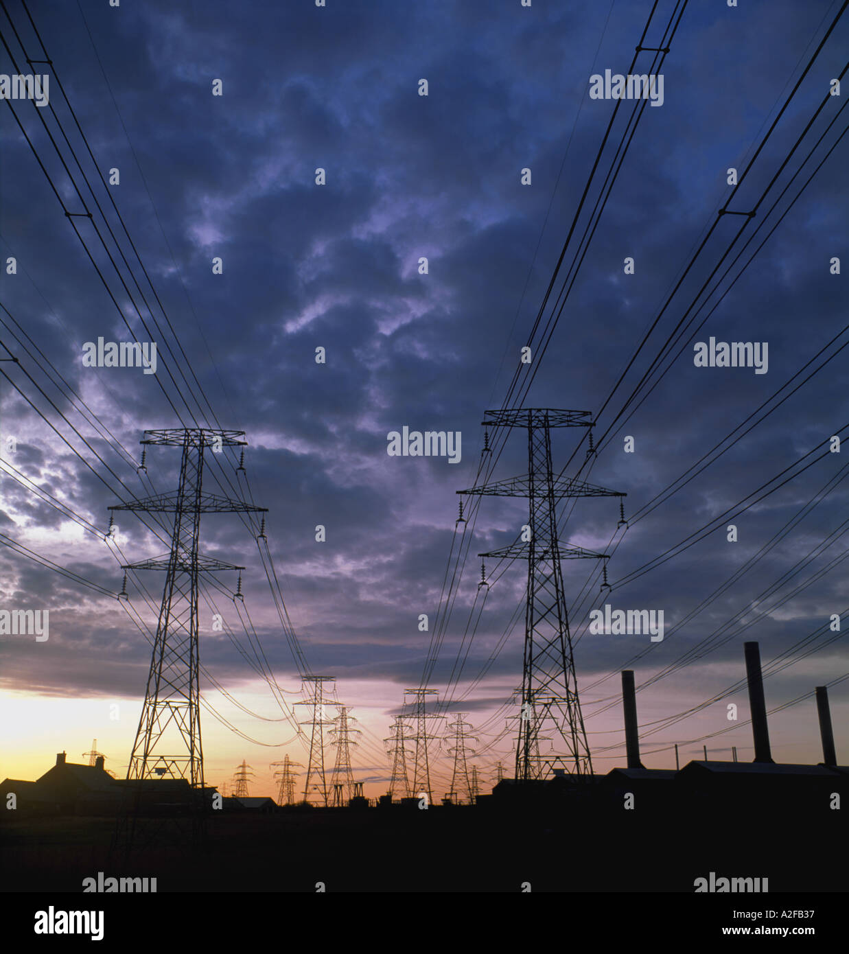 Electricity pylons at sunset; supplying British Alcan's aluminium ...