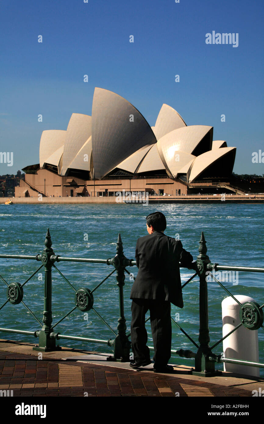 The Sydney Opera House on a beautiful day with Asian businessman in ...