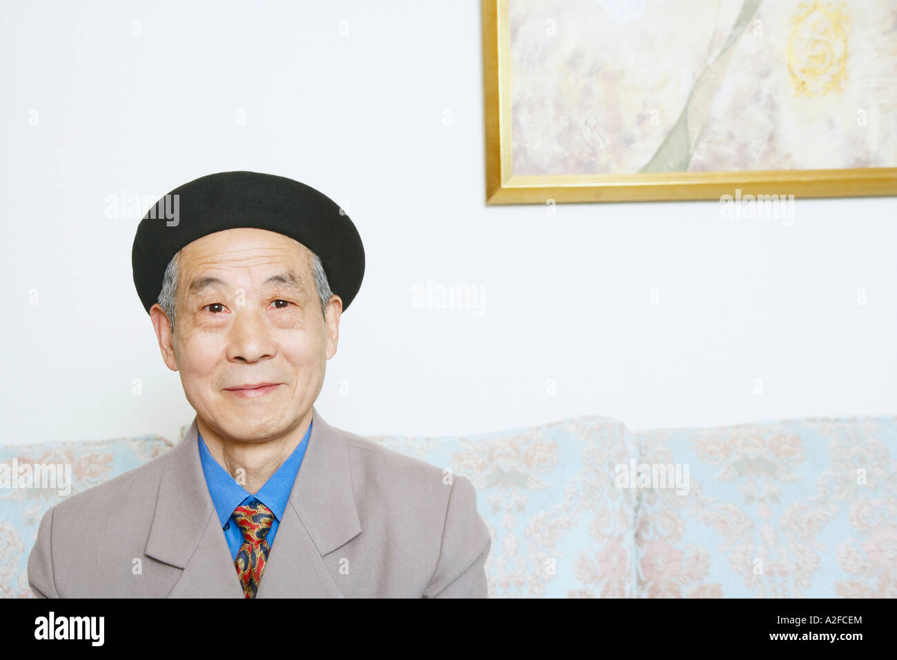Portrait of a senior man smiling Stock Photo - Alamy
