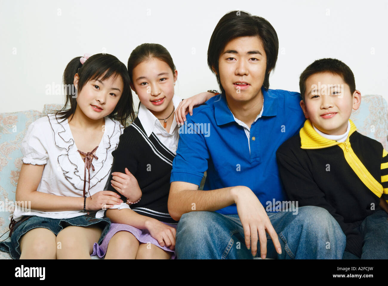 Chinese brothers smiling hi-res stock photography and images - Alamy