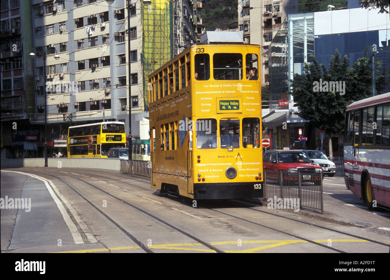 Yellow tram on Hong Kong Island Stock Photo - Alamy