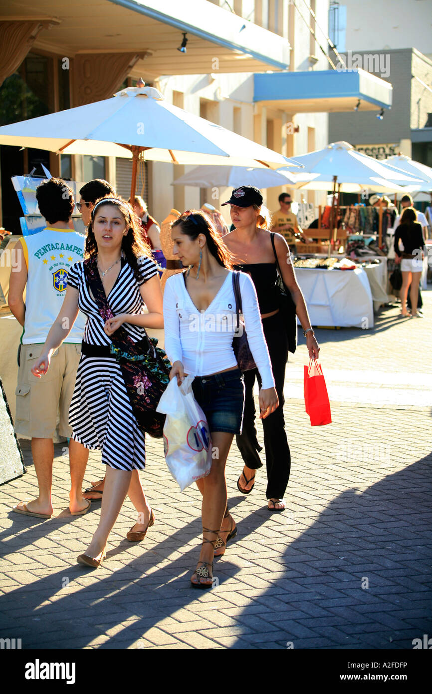 Young women shopping in an outdoor market at Manly Sydney Australia ...