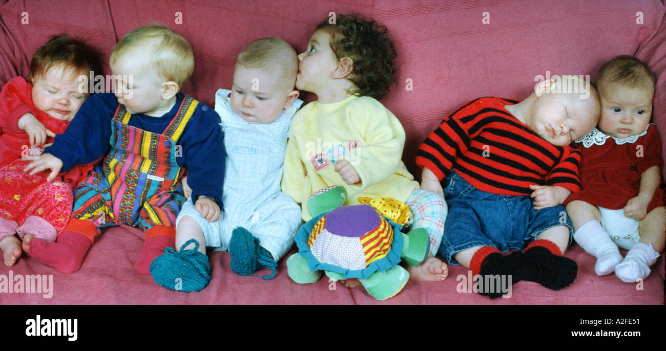 Group babies human sitting hi-res stock photography and images - Alamy