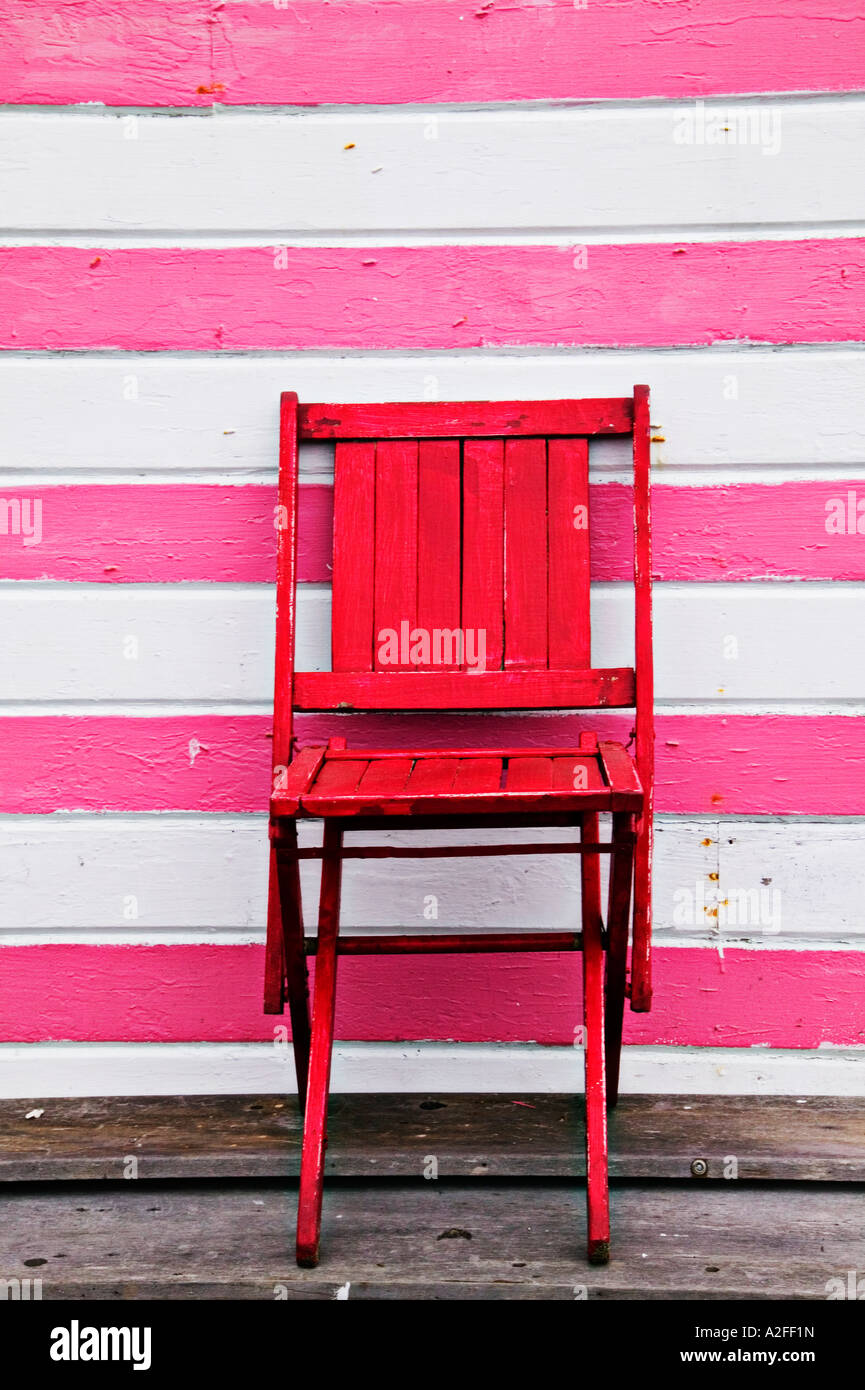 Red chair and pink strips Stock Photo - Alamy