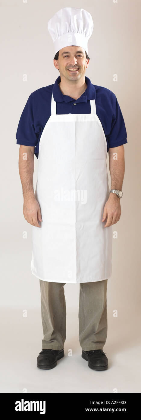 A smiling chef with hat and apron on white seemless background Stock ...