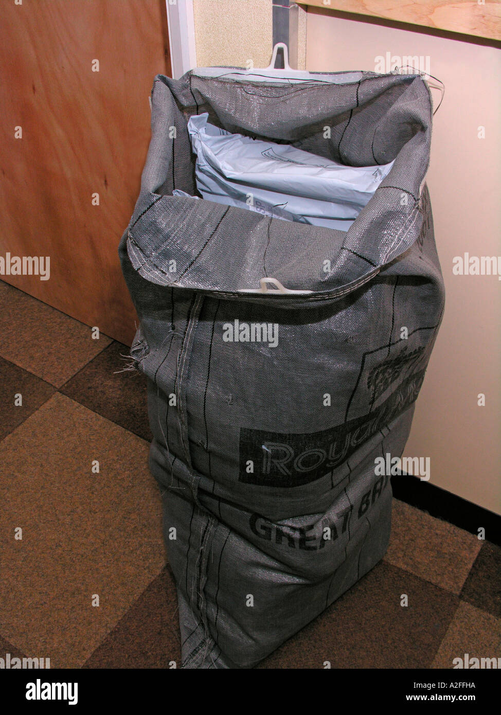 sack of parcels awaiting collection Stock Photo - Alamy
