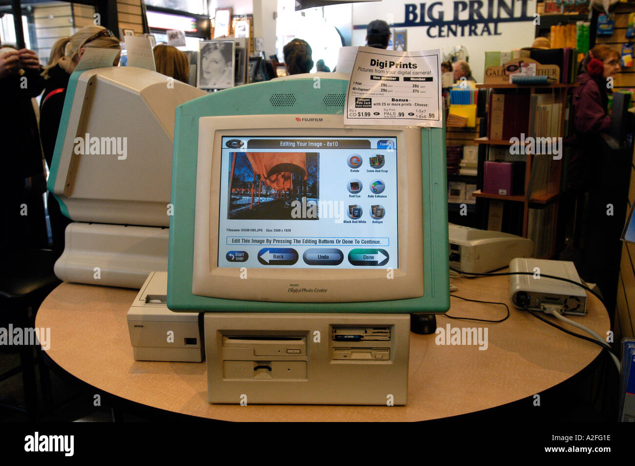 Customers at Ritz Camera print their digital camera photos at the ...